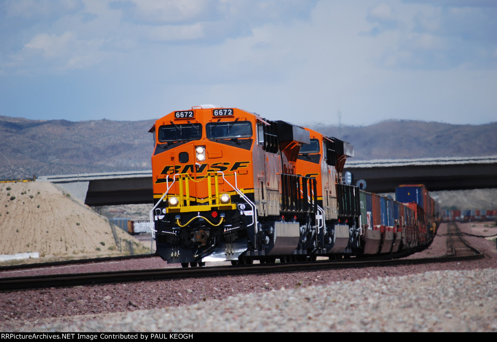 BNSF 6672 and BNSF 6673 on thier First Revenue Run westbound lead the Z CHI-SCO Intermodal Train ...